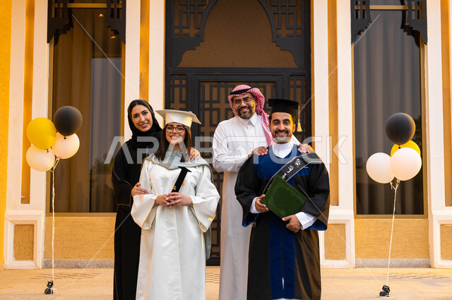 A happy Saudi Gulf Arab family celebrates graduation in one of the ...