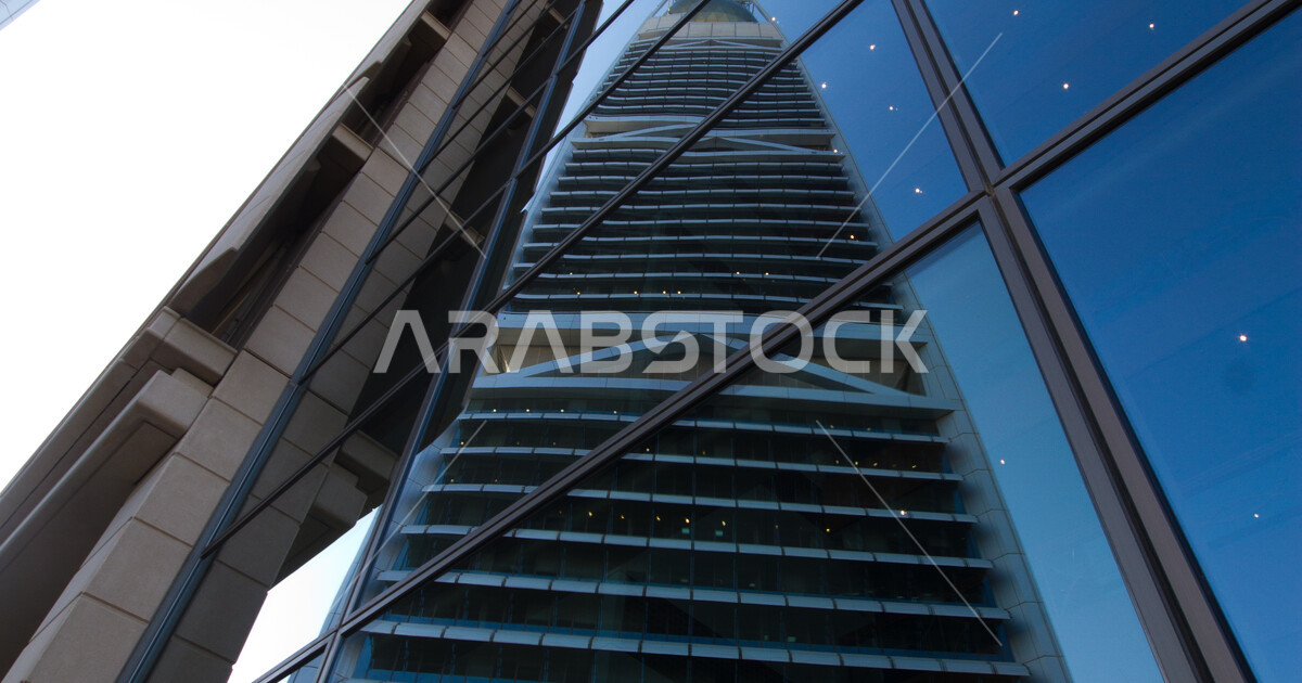 An aesthetic image of the reflection of Al-Faisaliah Tower on glass in ...