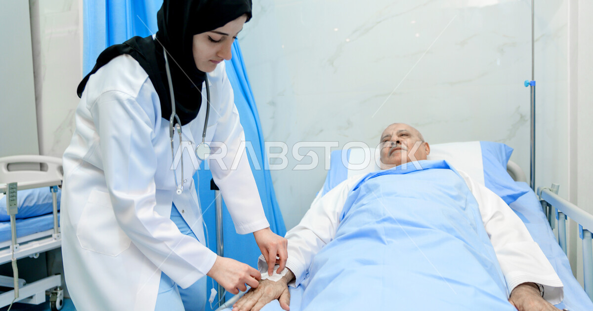 An old man, Arab, Gulf, Saudi, patient lying on a hospital bed ...