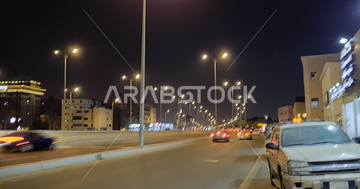 Car lane, Andalus Road in Jeddah, Saudi Arabia, street lighting poles ...