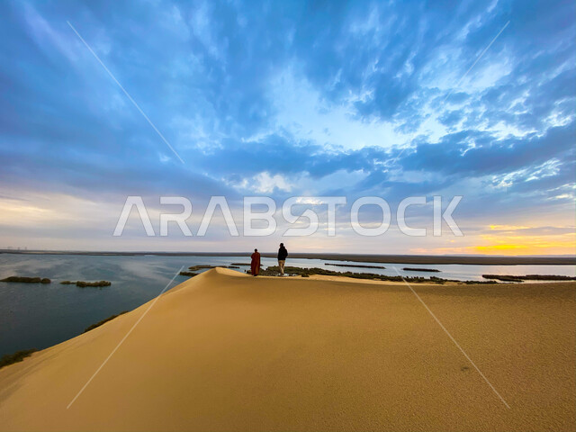 Soft golden sand dunes, quiet natural tourist places, the shore of Al ...
