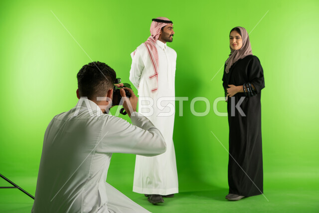 A modern electronic camera, a chroma for a photo session in the studio ...