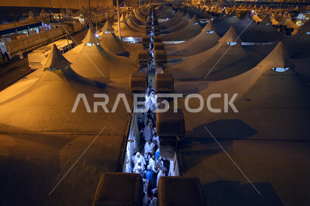 Arafat standing on the Mount of Mercy, the area of tents in Mina at ...