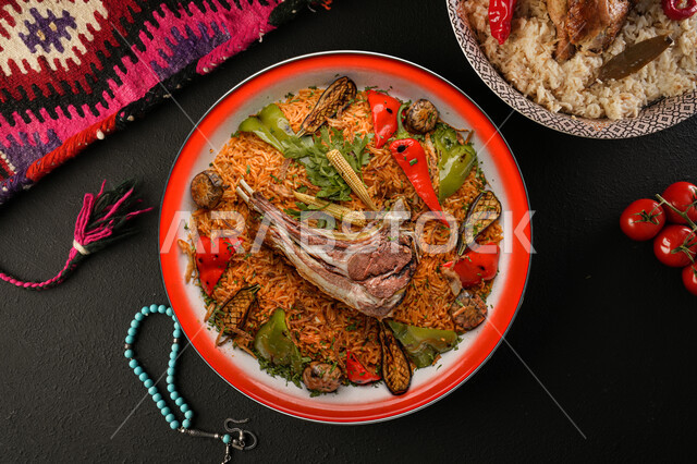 Dishes from popular traditional Arabic food, a dish of Kabsa rice with ...