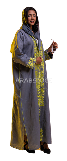 The concept of fashion and elegance, a portrait of a smiling Saudi Gulf ...