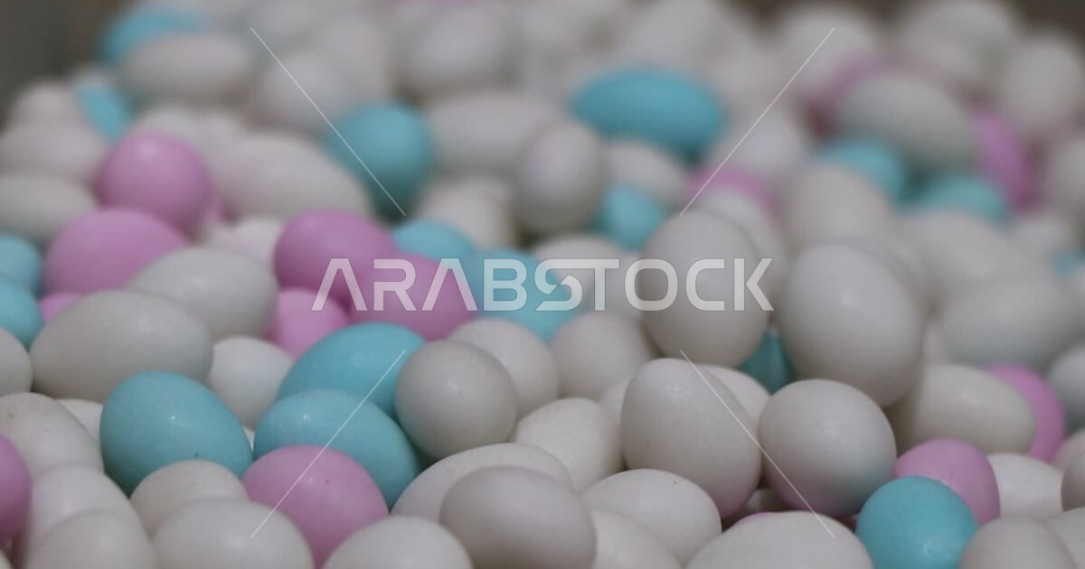 Close-up of delicious dressed candy, Eid sweets, sugar-dipped almonds ...