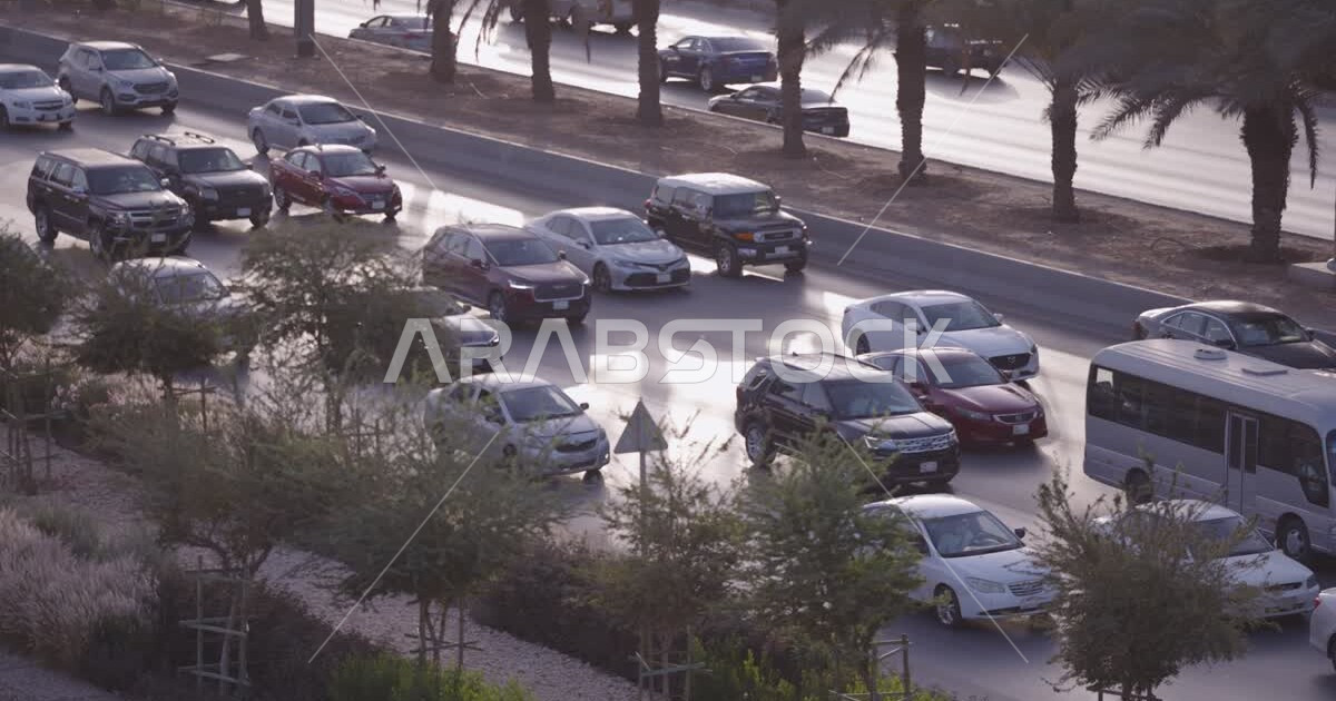 Streets of Riyadh in the Kingdom of Saudi Arabia, car traffic, green ...