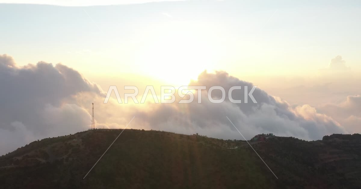 White clouds and clouds, mountains and highlands in Asir, Saudi Arabia ...