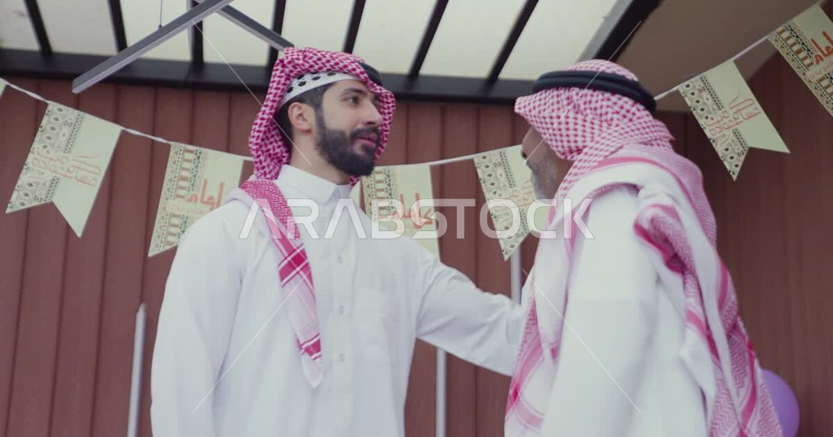 An Arab, Saudi, Gulf man wearing the traditional Saudi dress and the ...