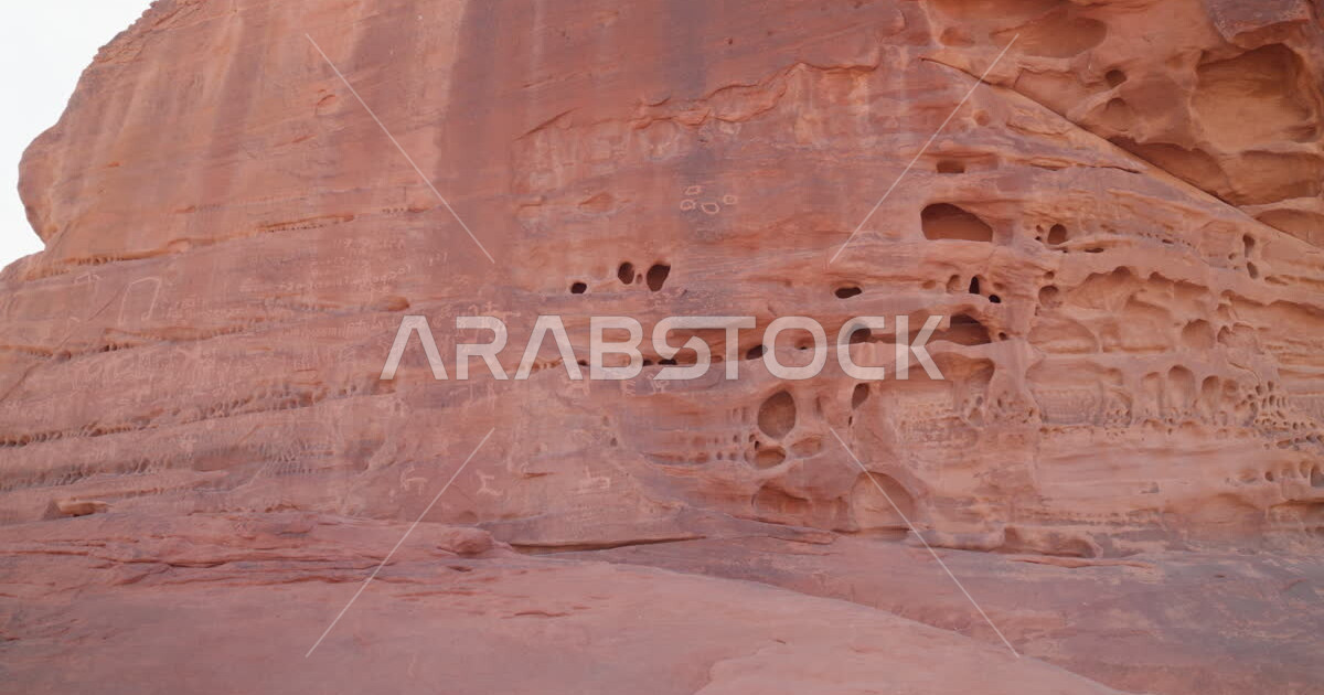 Archaeological drawings and rock inscriptions on sandy rocks in the ...
