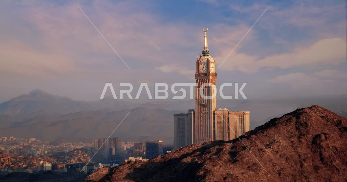 The movement of clouds in the sky above the clock tower in Makkah Al ...