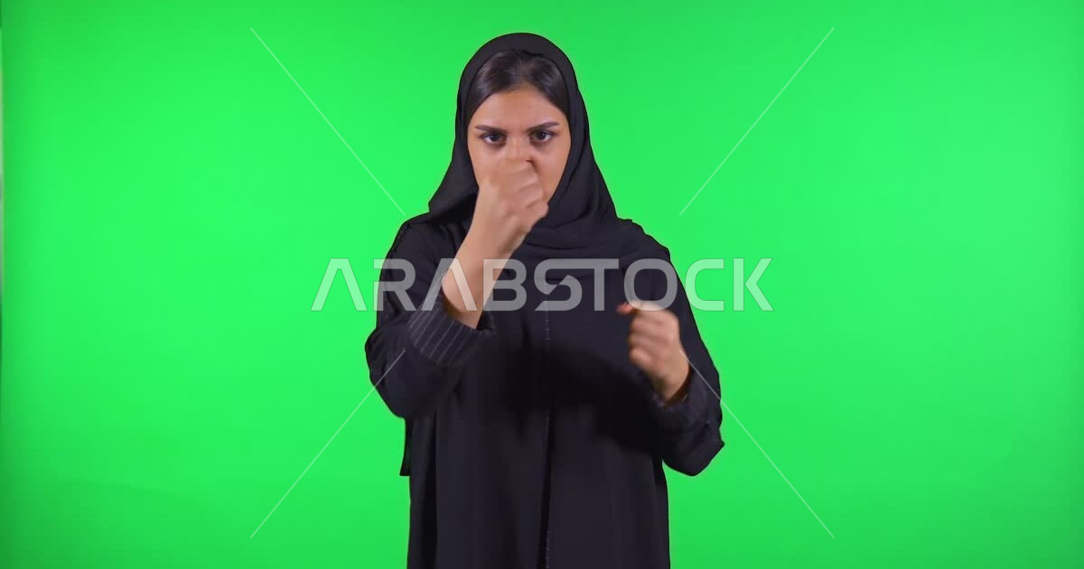 Chroma of a Saudi Arabian Gulf woman, angry and frightened, with ...