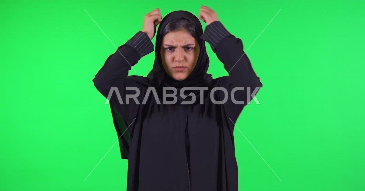 Chroma of a Saudi Arabian Gulf woman, angry and frightened, with ...