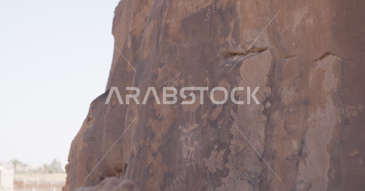 Close-up of historical rock inscriptions and drawings in Hail, Saudi ...