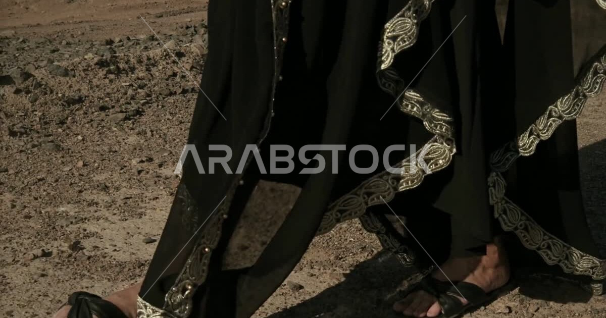 A close-up of the feet of a Saudi Arabian Gulf woman walking in the ...