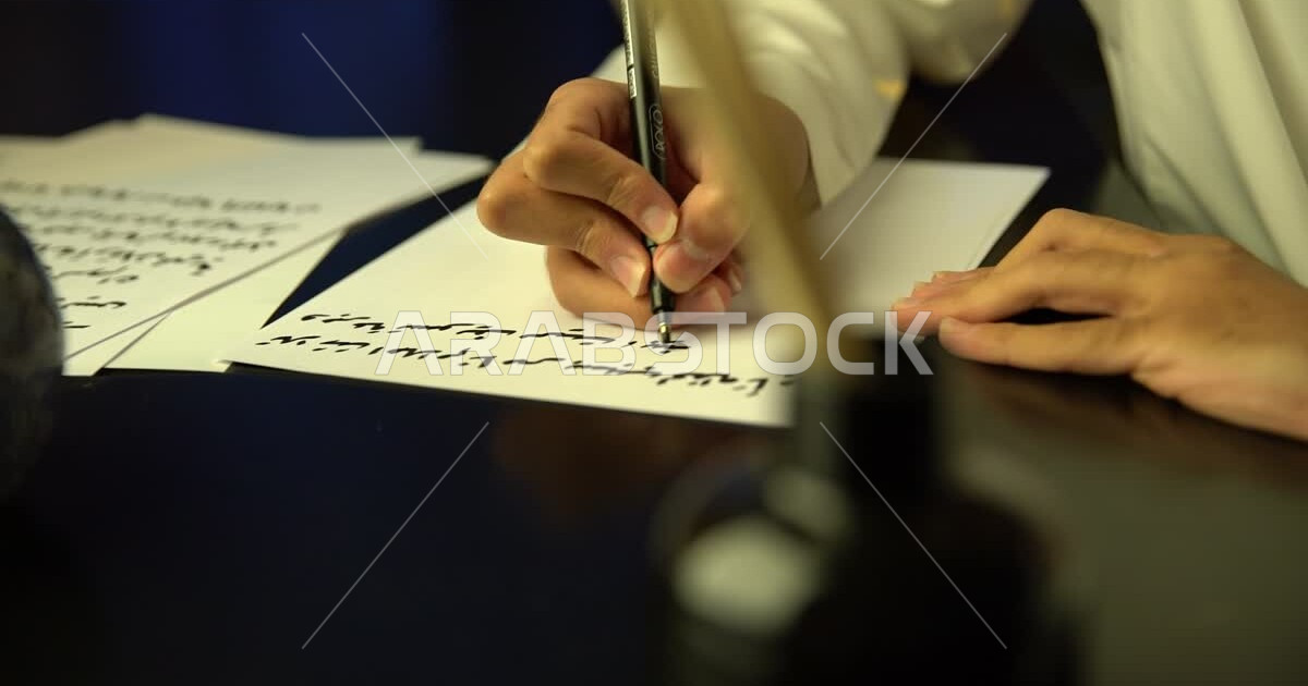 A close-up of a Saudi Arabian Gulf writer who writes and composes ...