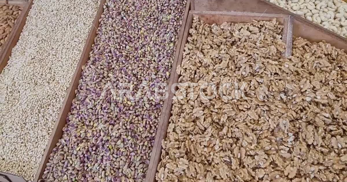 Close-up of fresh nuts, types of mixed nuts, various commodities and ...