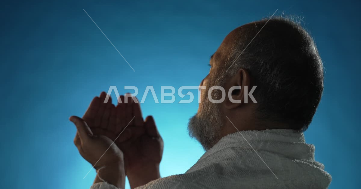 Performing the rituals of Hajj and Umrah, a close-up of an elderly ...