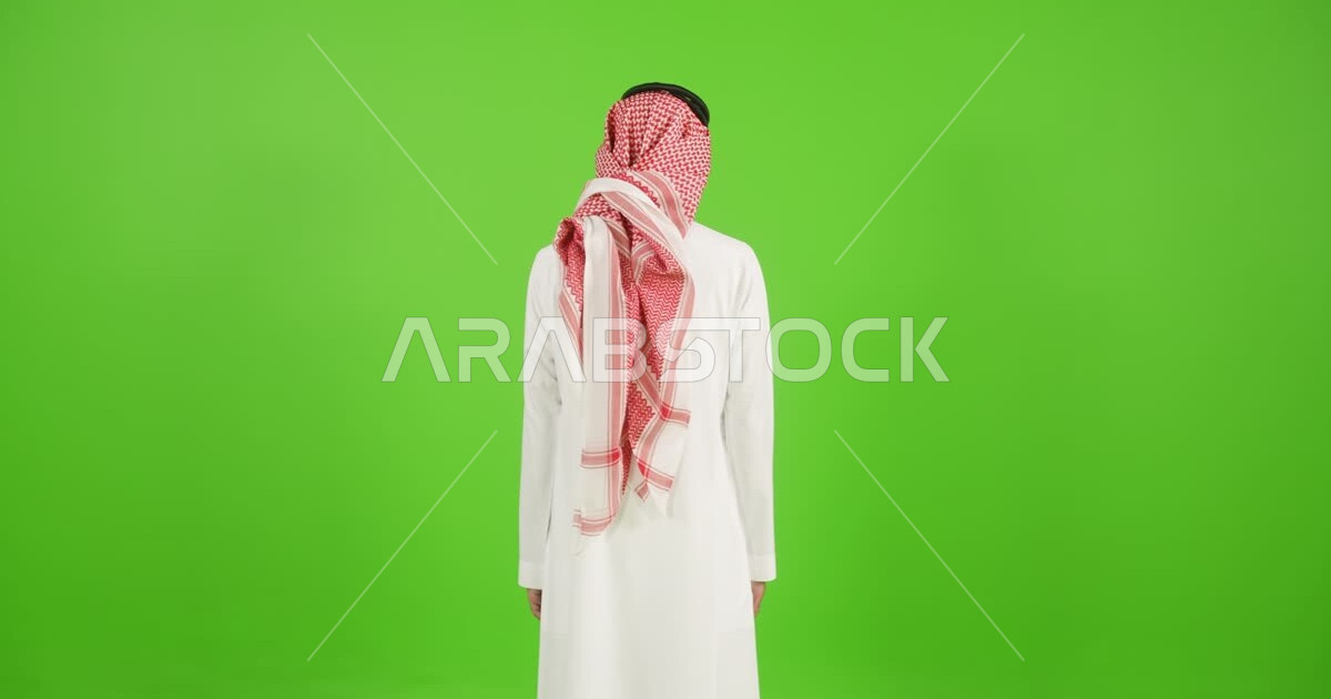 Chroma a man standing with different gestures, a back view of a Saudi ...