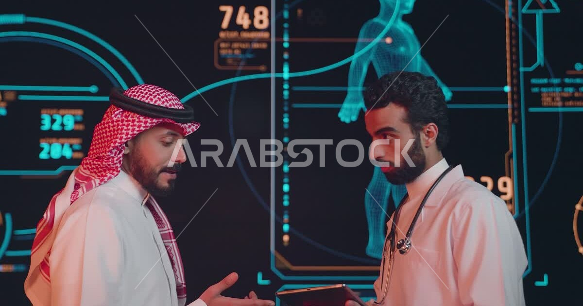 A Saudi Arabian Gulf doctor and man using technology in medical ...