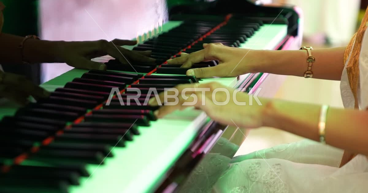 Musical talents, close-up of a Saudi Arabian Gulf artist who enjoys ...