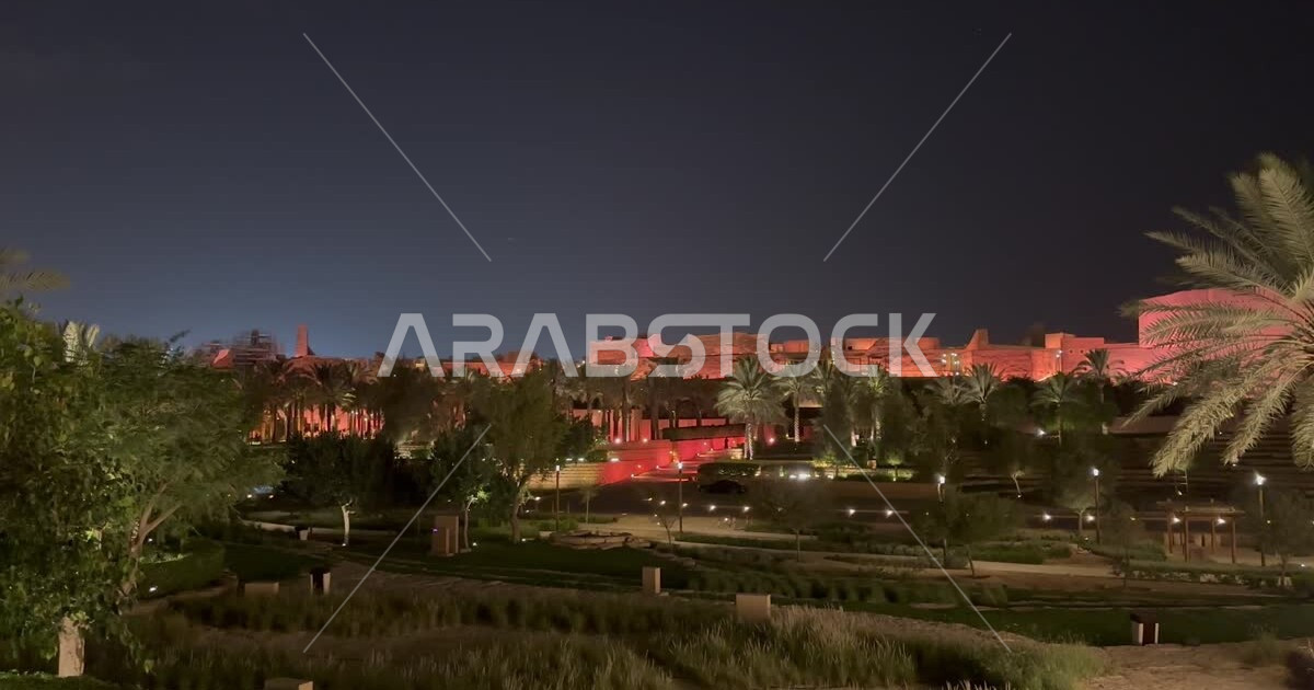 Cultivation of plants and palm trees, historical Saudi landmarks, mud ...