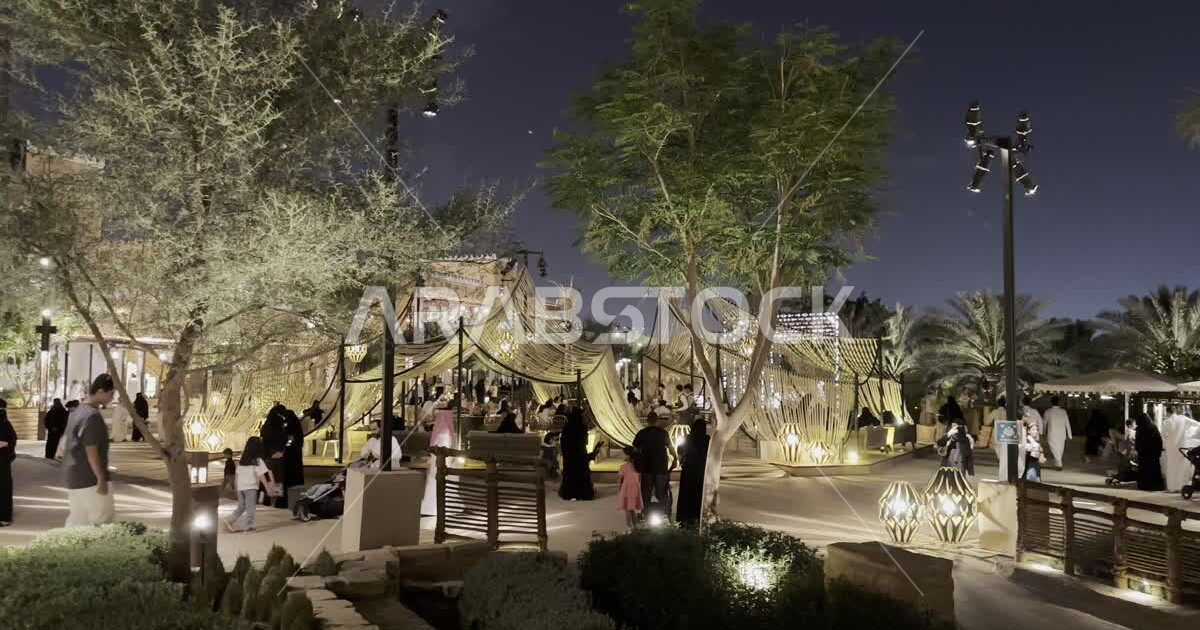 A group of visitors in the historical Al-Turaif neighborhood in Al ...