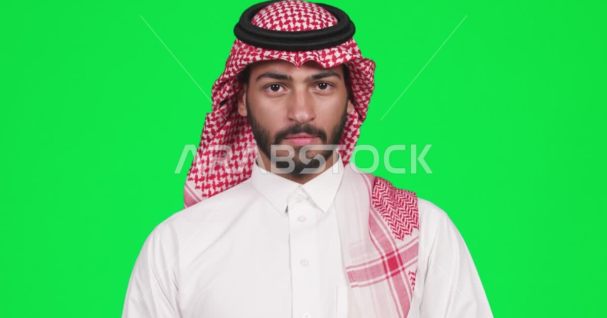 Chroma close-up of a smiling Saudi Arab Gulf youth wearing the ...