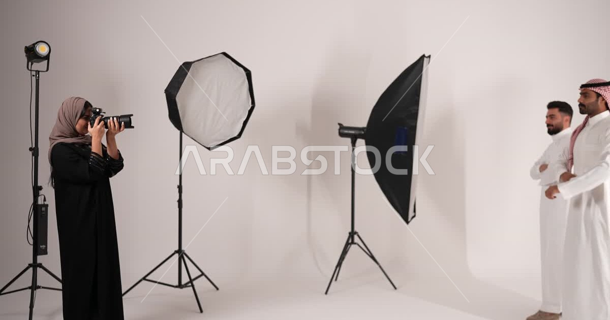 A photo session in the studio, behind the scenes, a professional Saudi ...