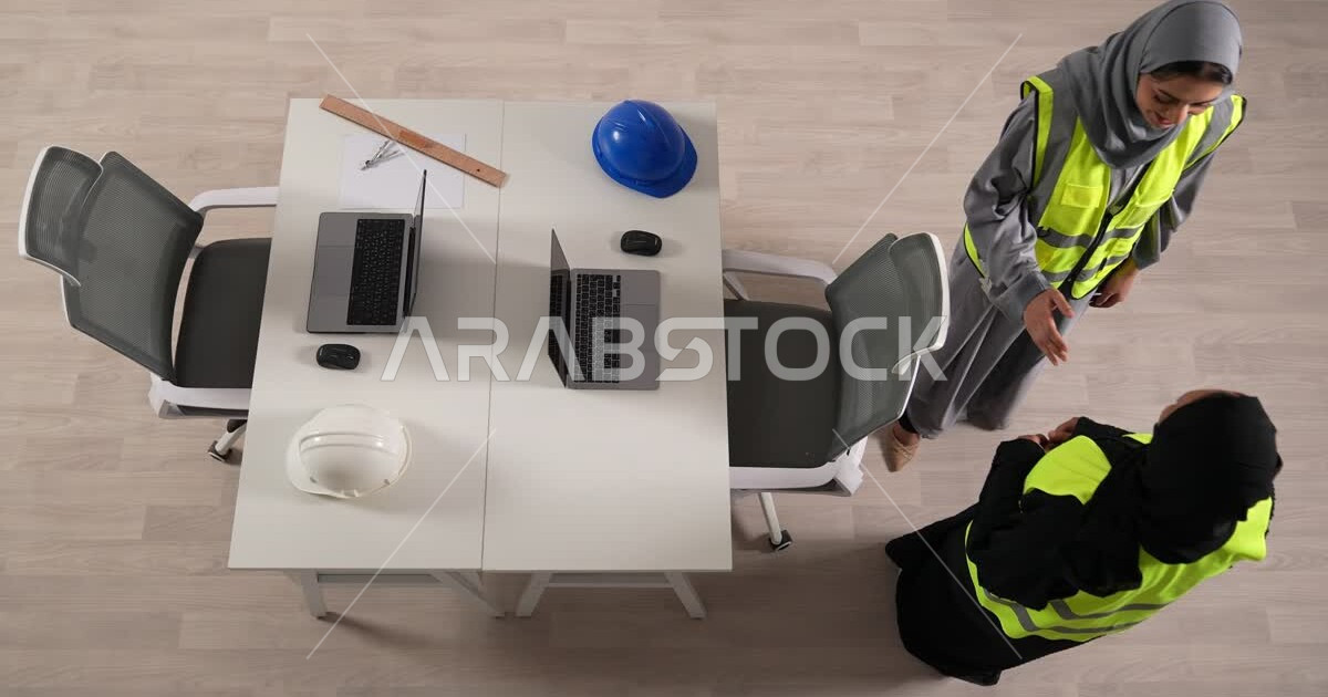 Using a laptop computer, Saudi job opportunities, vertical photograph ...