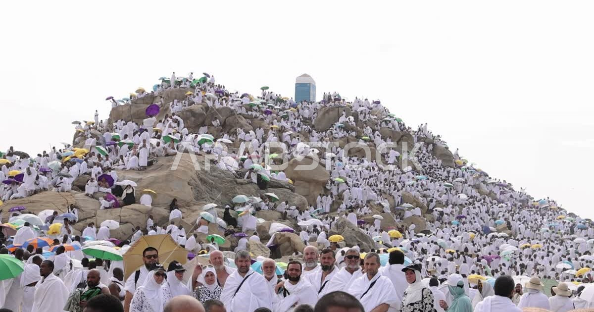 A close-up of the pilgrims of the Sacred House of God on the Mount of ...
