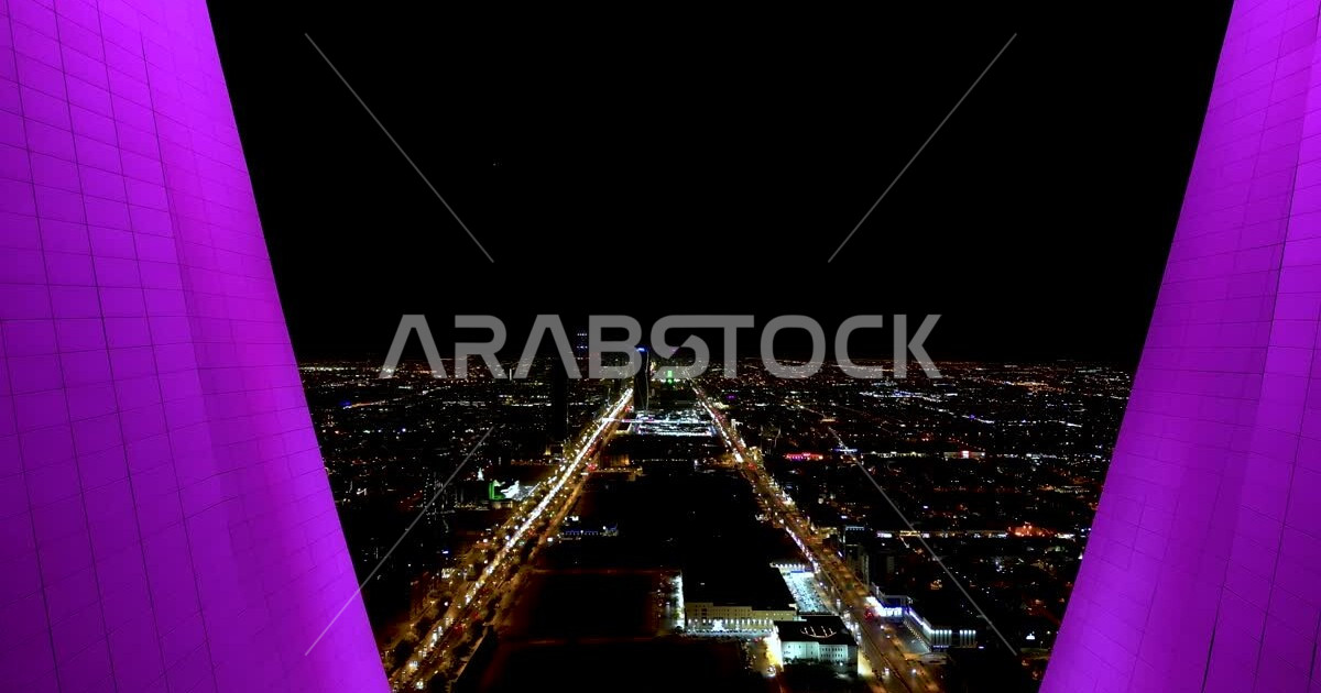 Drone photography of the luminous Kingdom Tower at night, towers and ...