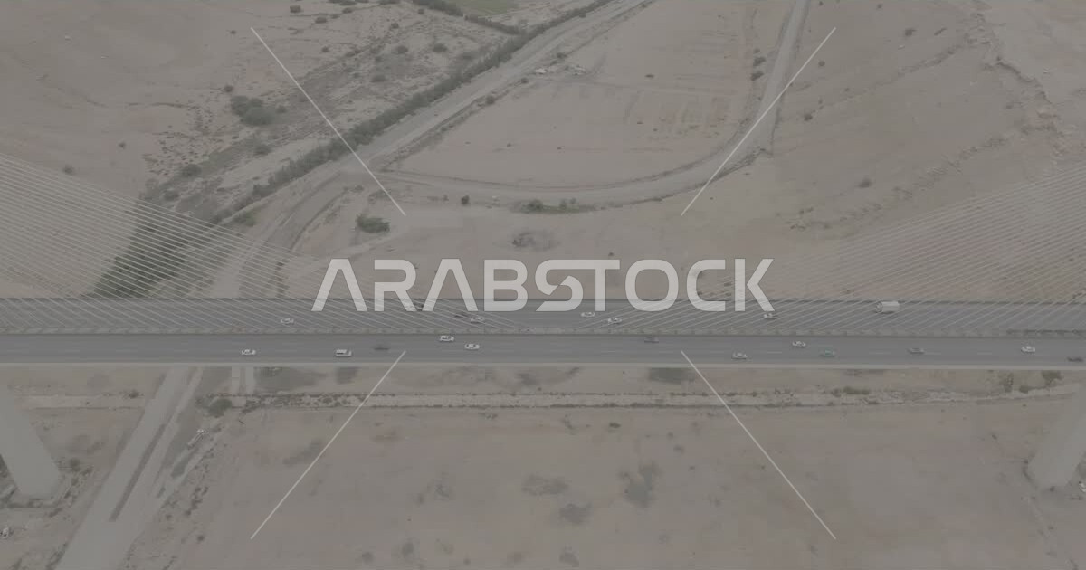 Drone photography of the Wadi Laban bridge supported by cables in the ...
