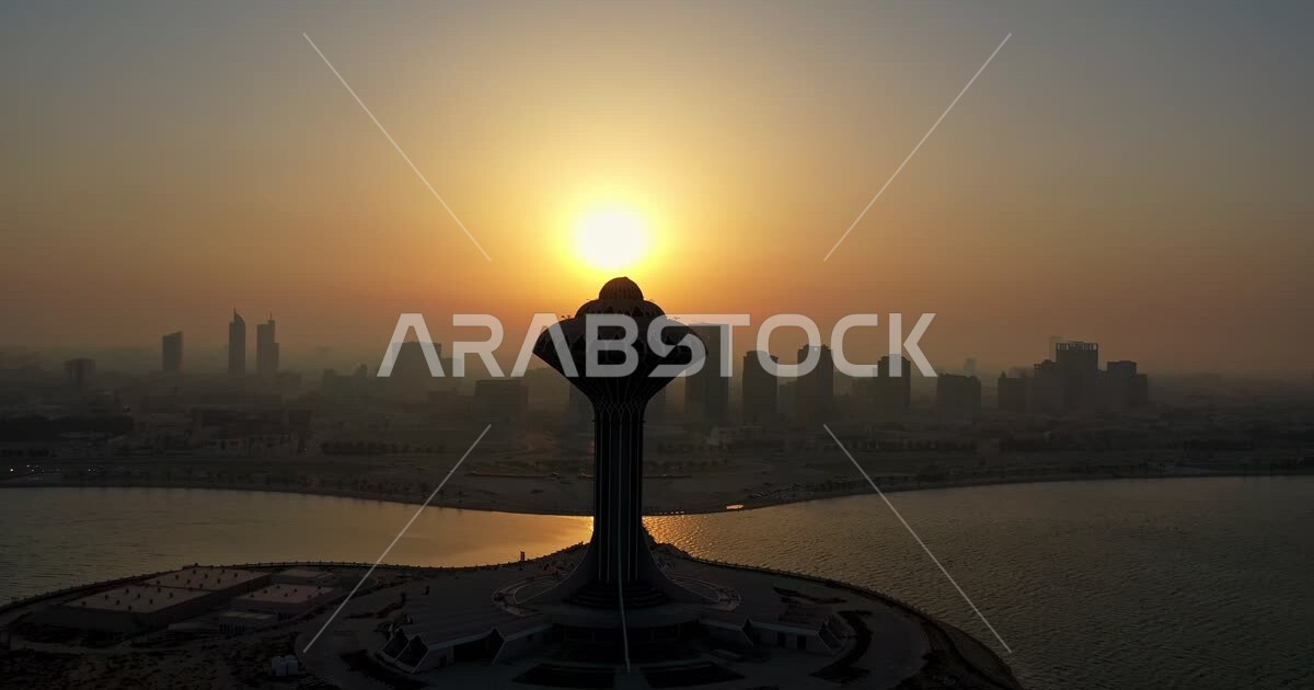 View of the sun disk at sunset, drone photography of the water tower in ...
