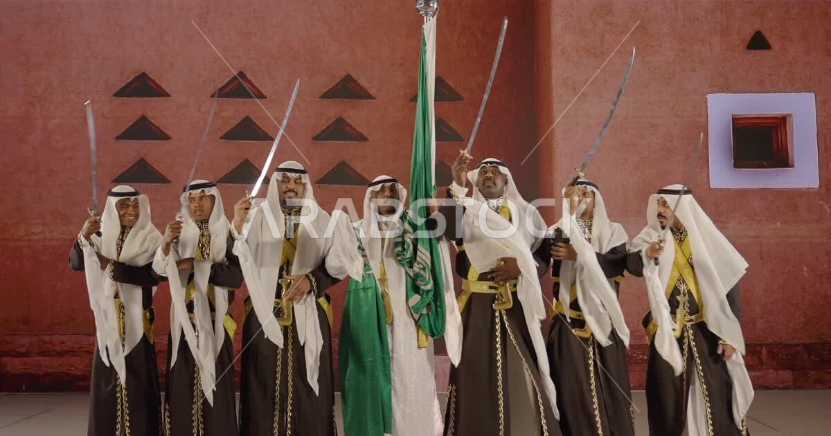 The Hijazi Ardha, songs, and folk dancing with swords in front of the National Historical Museum ...