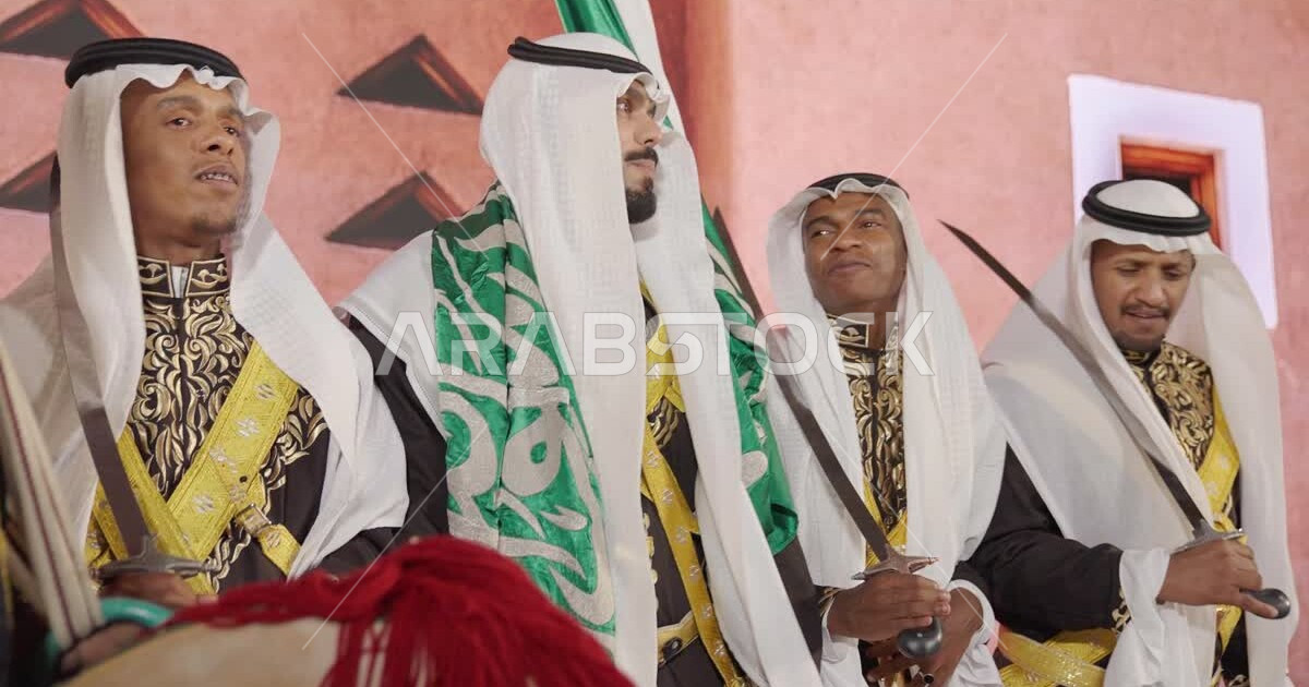 Al-Ardah Al-Hijaziya Ensemble, songs and folk dance with swords in ...