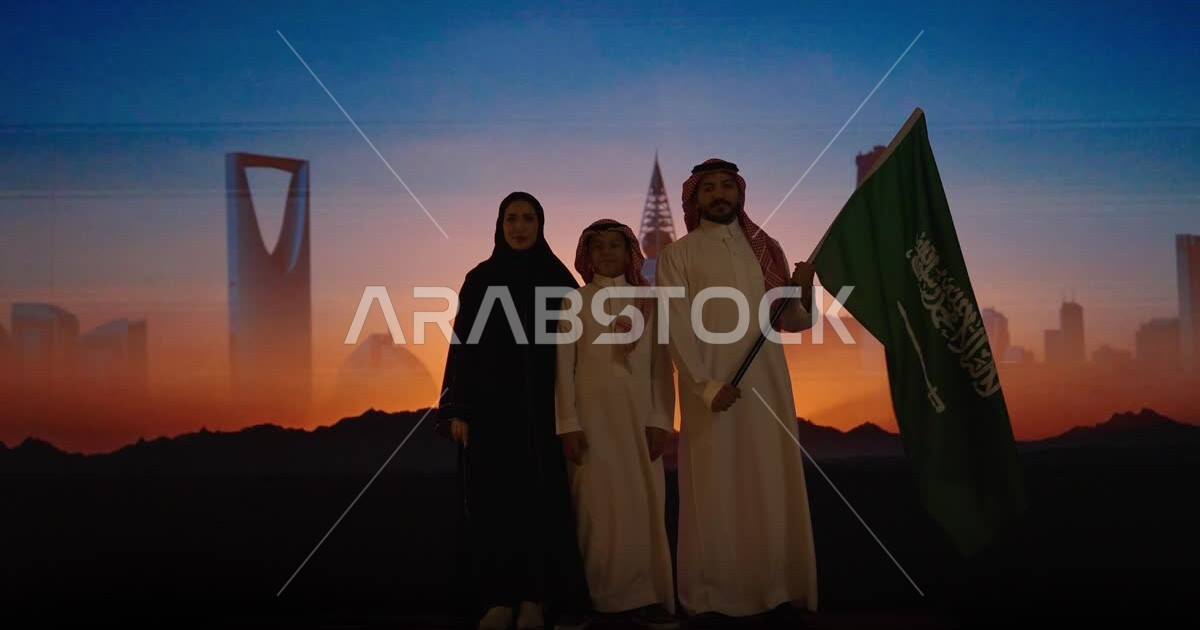 Raising the flag and emblem of Saudi Arabia, pride and flaunting the ...