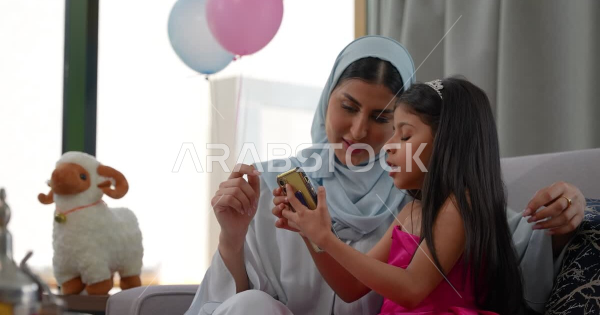 Hanging out and laughing with family members, a Saudi Gulf Arab woman ...