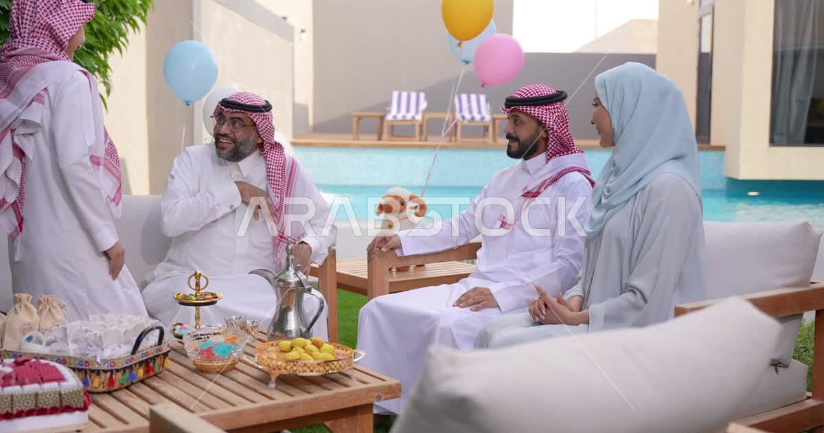 A happy family atmosphere on the blessed Eid, a Saudi Arabian Gulf man ...