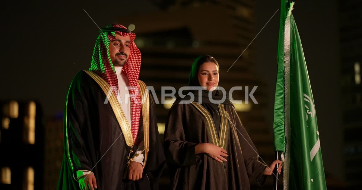 Wearing traditional Saudi dress, expressing love and loyalty to the ...