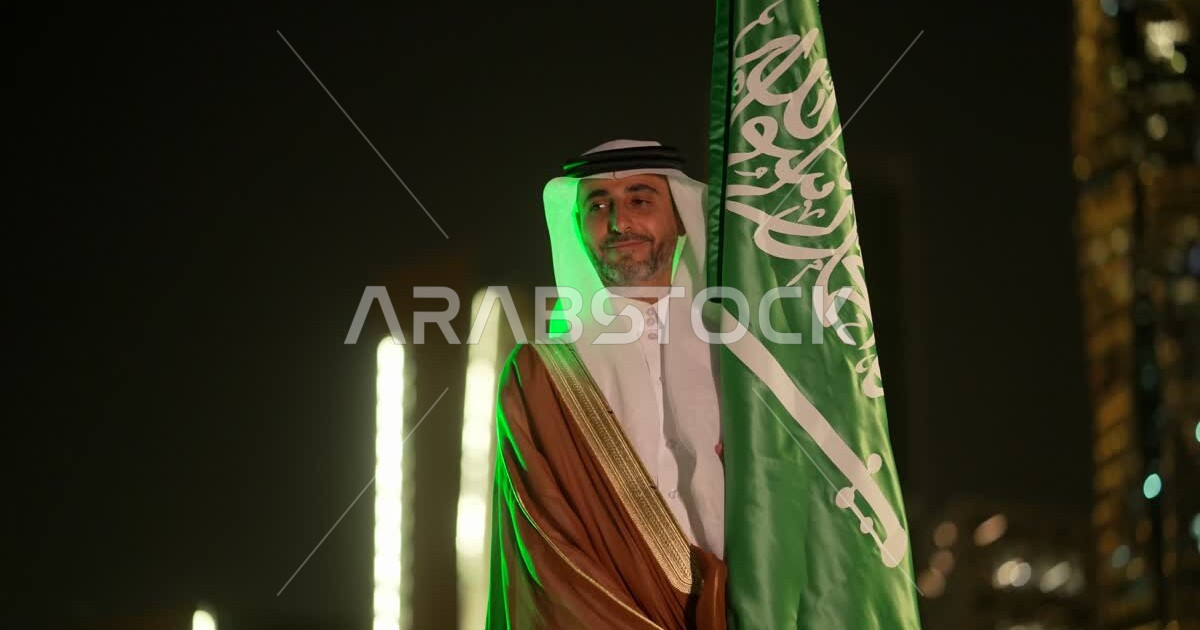 Saudi Flag Day 1445 AH, preserving the Saudi identity, standing ...