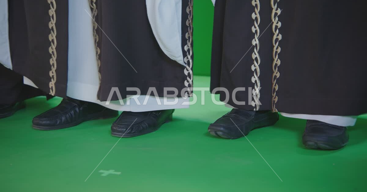 Close-up still photography of the feet of Saudi Gulf Arab men dancing ...