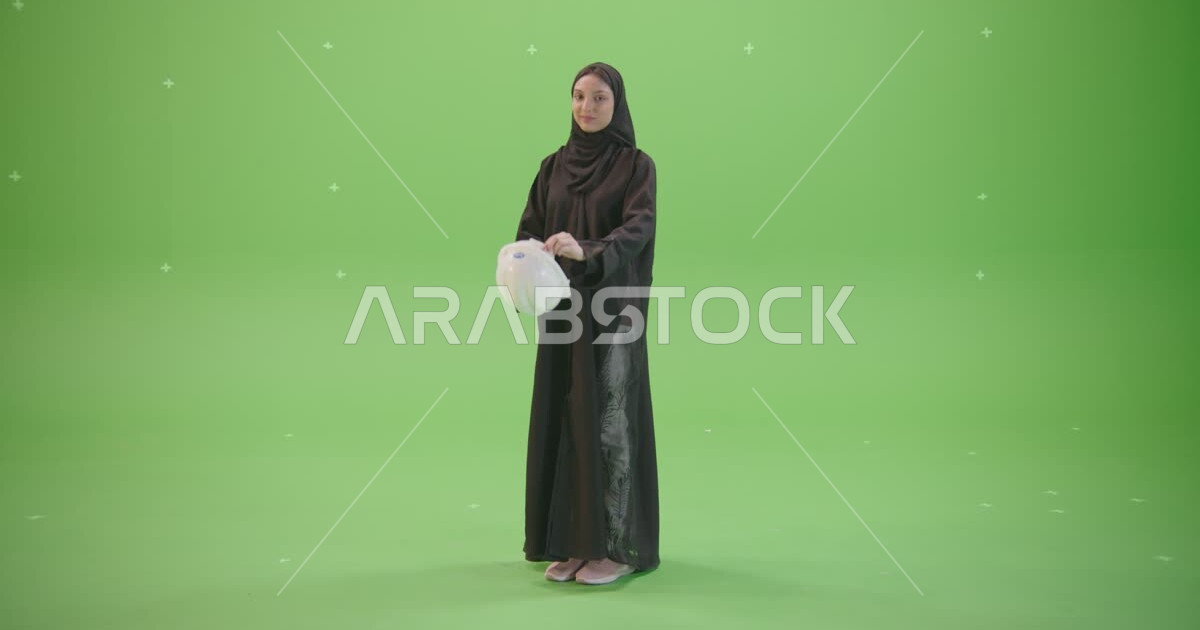 Managing and studying engineering projects, standing with crossed hands ...