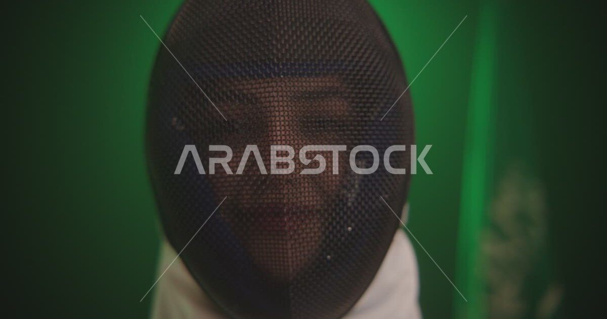Practicing Olympic fencing sports, close-up photography of a Saudi ...