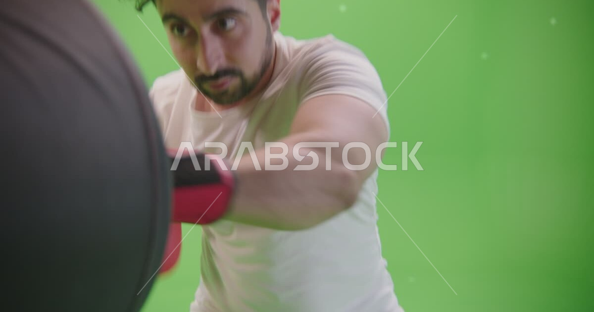 Close-up photography of a Saudi Arabian Gulf boxer wearing boxing ...