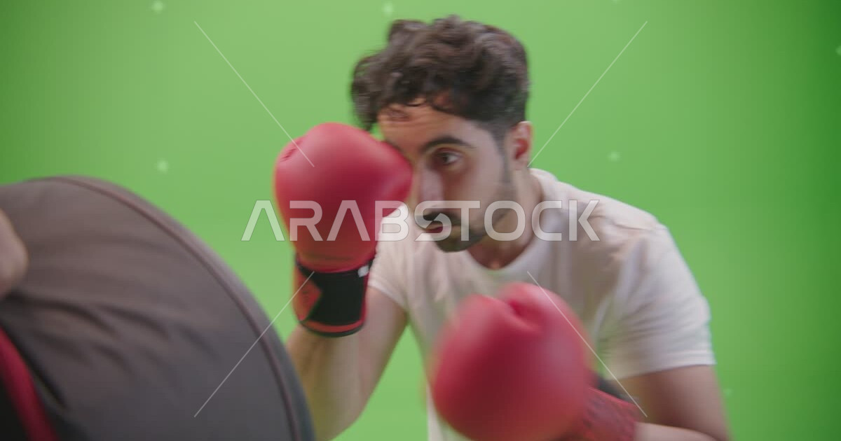 Close-up photography of a Saudi Arabian Gulf boxer wearing boxing ...