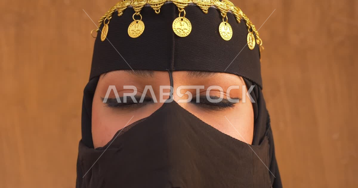 Showing black kohl-lined eyes, the Bedouin Arab beauty of Saudi women ...
