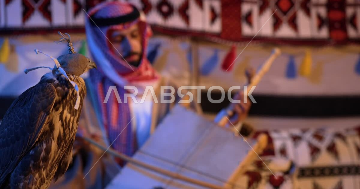 Enjoying the traditional Saudi sessions, playing stringed instruments ...
