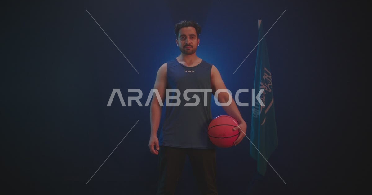 Saudi Flag Day, March 11, a young Saudi Gulf Arab man holding a ...
