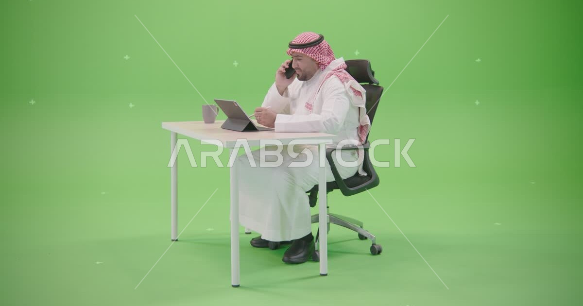 Using modern technologies in office work, still photography of a Saudi ...